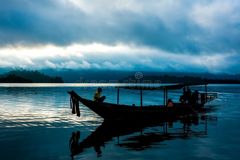 A Wooden Long Pontoon, a Pier with a Rope Railing on the Sea on the ...