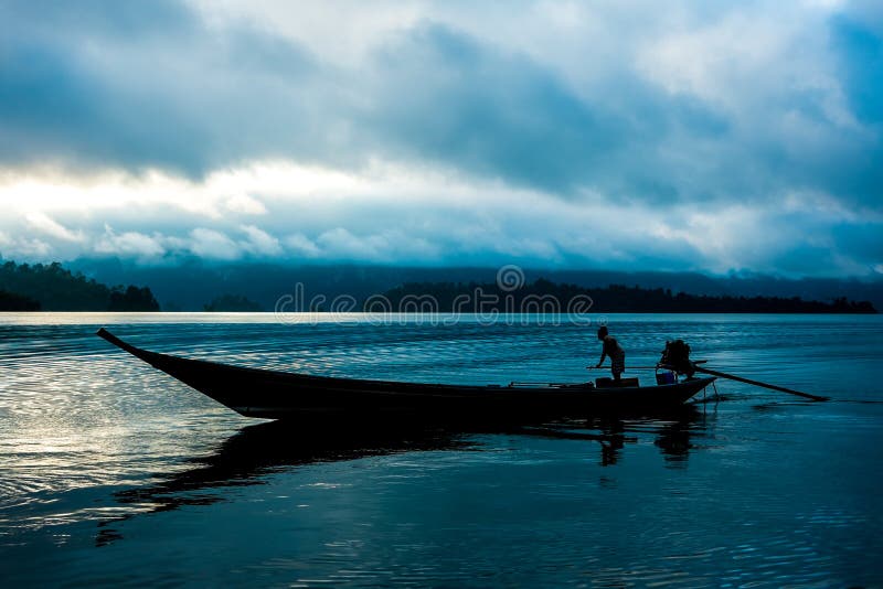 A Wooden Long Pontoon, a Pier with a Rope Railing on the Sea on the ...