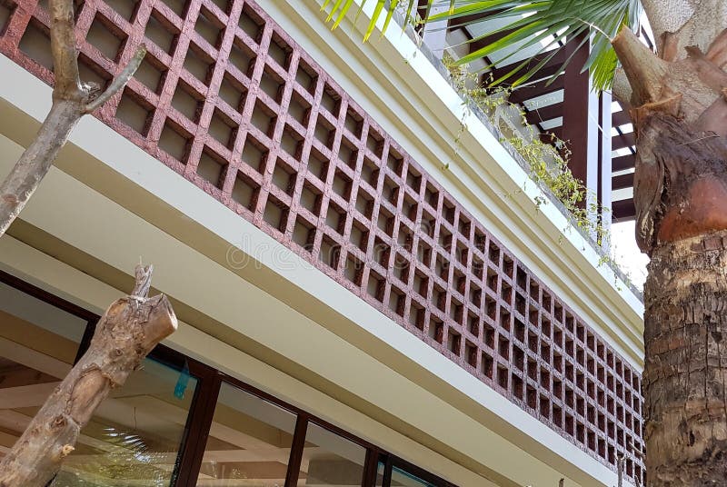 Wooden Louver or Roster or Perforated Wall on the Modern Building ...