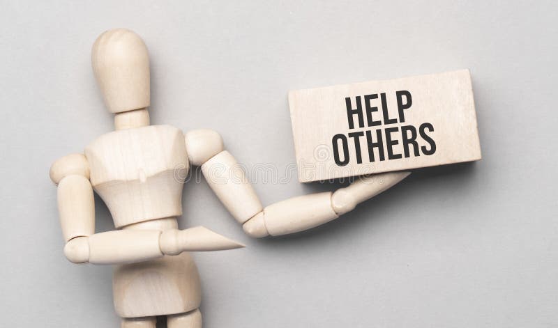 Wooden Man Shows with a Hand To White Board with Text Help Others ...