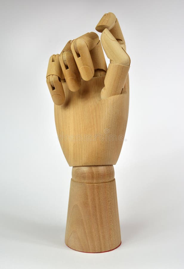 Wooden Mannequin Hand stock photo. Image of clutching - 191706420