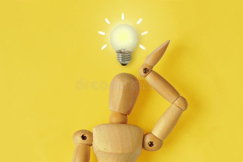 Wooden Mannequin with Light Bulb - Concept of Ideas and Creative ...