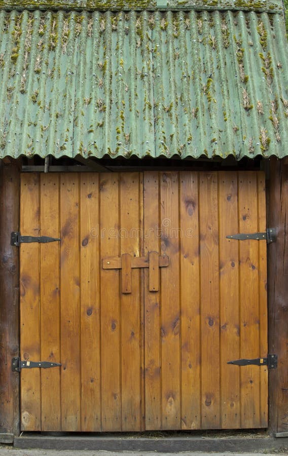 Wooden, Massive, Double-leaf Hinged Doors Stock Photo - Image of ...