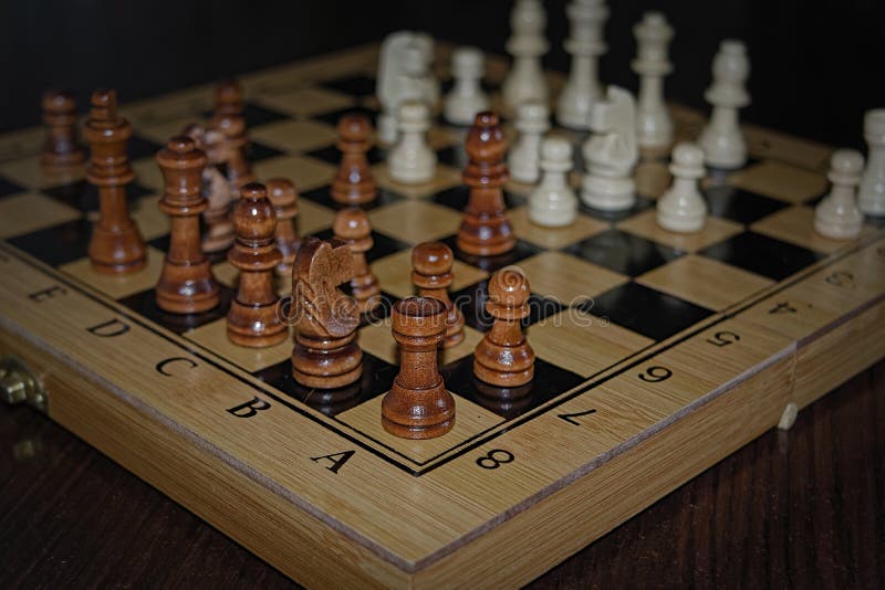 Wooden Material Chess Board and Chess Pieces in Low Light Stock Photo ...