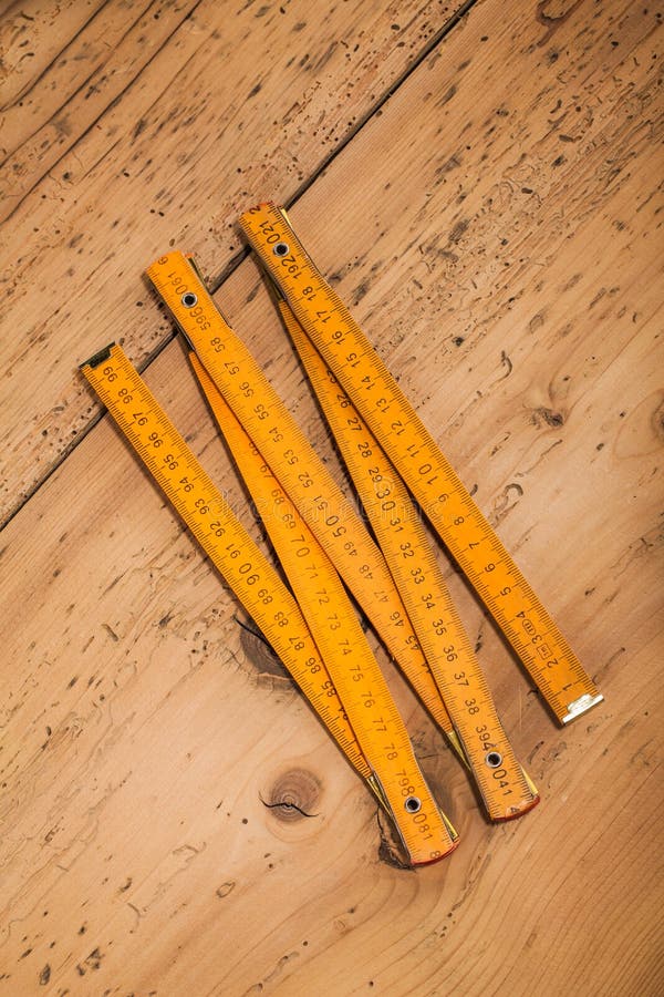 Wooden Measure Tool on Table Stock Image - Image of lumber, power: 50647289