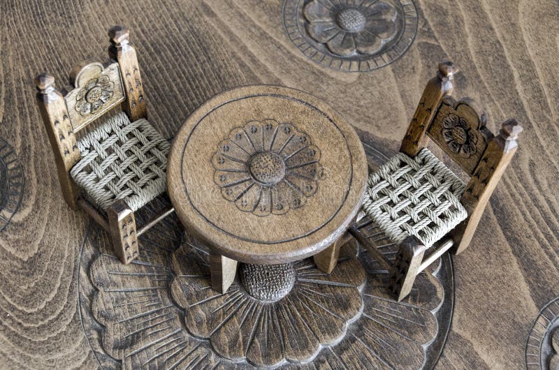 Wooden Miniatures Hand Made Chairs on Carved Table Stock Photo - Image ...