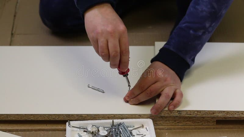 Wooden Modular Rack. Assembling a Modular Rack. a Man Installs an ...