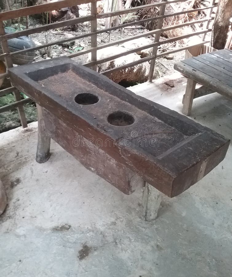 Wooden Mortar with Two Holes and Three Legs. Stock Image - Image of ...