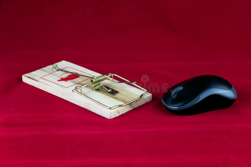 Wooden Mouse Trap and Computer Mouse on a Red Background Stock Image ...