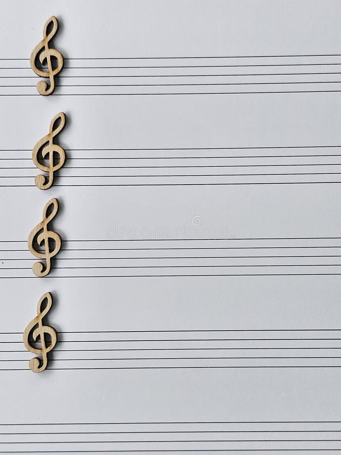 Wooden Musical Notes Placed on Blank Sheet Music Ready for Composition ...