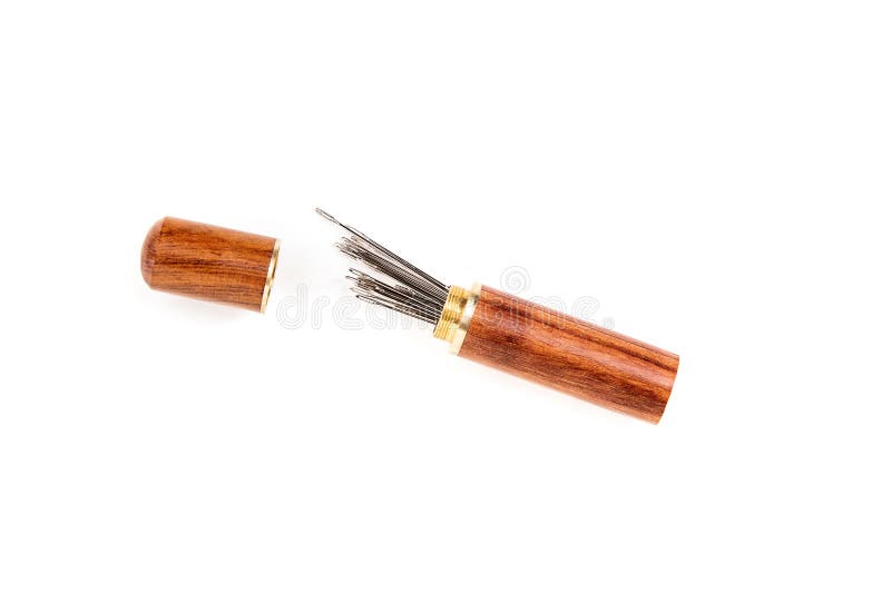 Wooden Needle Holder with Bunch of Needles Inside Isolated Over White ...