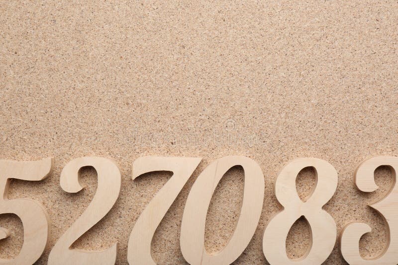 Wooden Numbers on Fiberboard, Flat Lay. Space for Text Stock Image ...