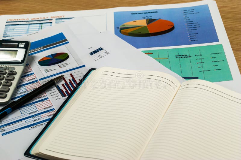 Wooden Office Desk with Open Diary Book and Data Chart Stock Image ...