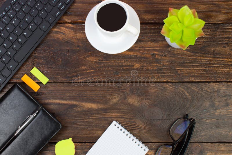 Wooden Office Table with Computer, Pen and a Cup of Coffee, Lot of ...