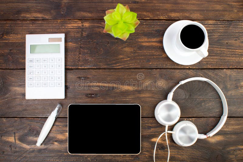 Wooden Office Table with Computer, Pen and a Cup of Coffee, Lot of ...