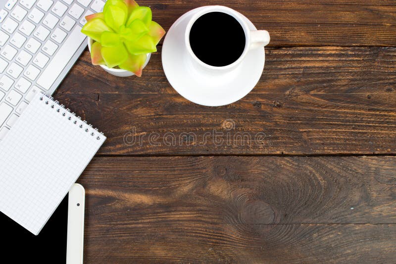Wooden Office Table with Computer, Pen and a Cup of Coffee, Lot of ...