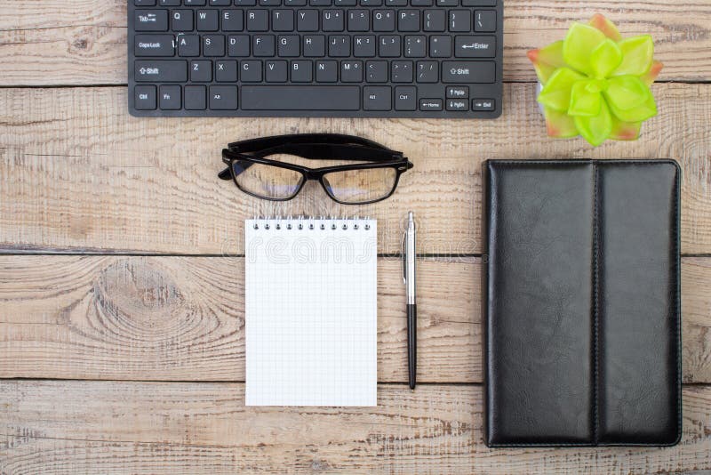 Wooden Office Table with Computer, Pen and a Cup of Coffee, Lot of ...