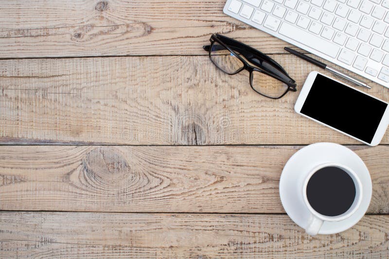 Wooden Office Table with Computer, Pen and a Cup of Coffee, Lot of ...