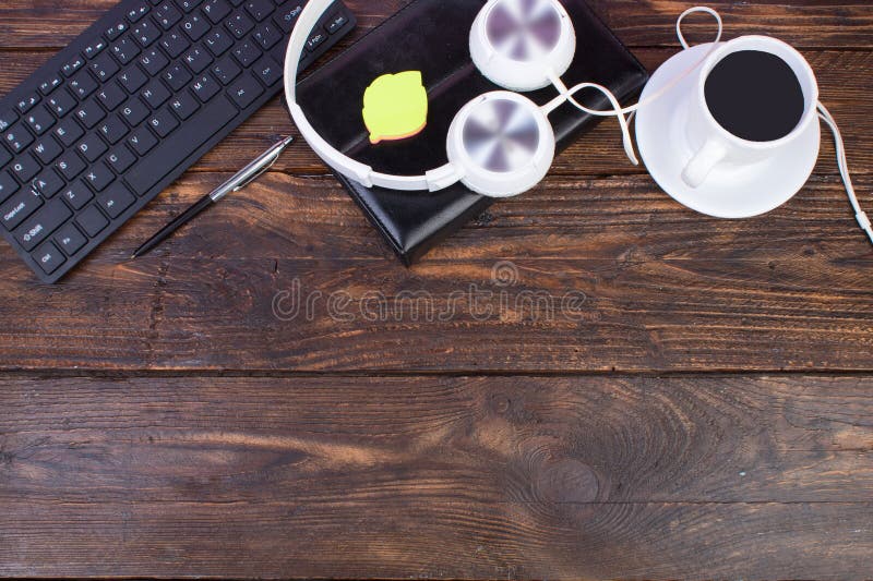 Wooden Office Table with Computer, Pen and a Cup of Coffee, Lot of ...