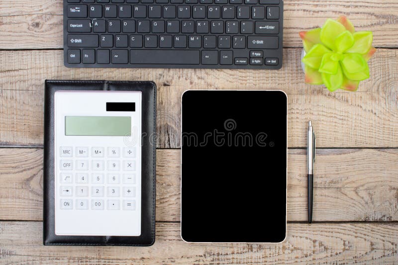Wooden Office Table with Computer, Pen and a Cup of Coffee, Lot of ...