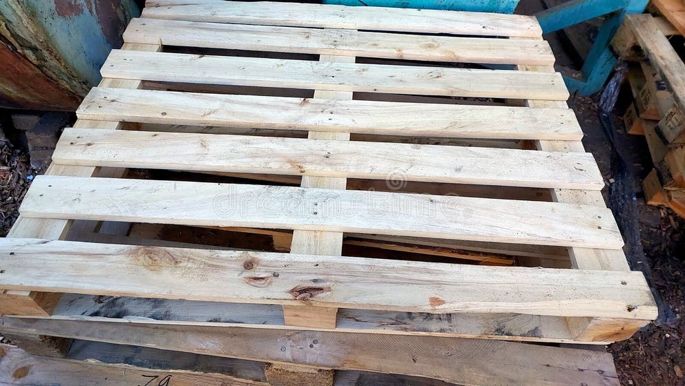 Wooden Pallet Resting on a Stack at a Construction Site during Daylight ...
