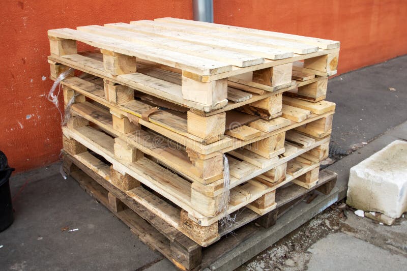 Wooden Pallets Against Wall of Store Close Up Stock Image - Image of ...