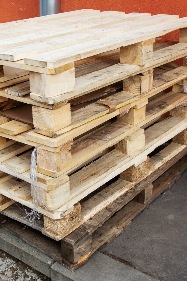 Wooden Pallets Against Wall of Store Close Up Stock Photo - Image of ...