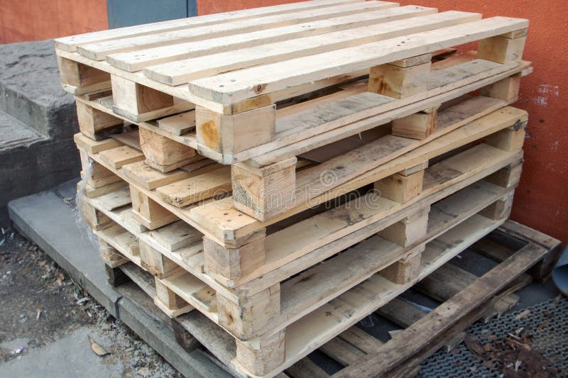 Wooden Pallets Against Wall of Store Close Up Stock Photo - Image of ...