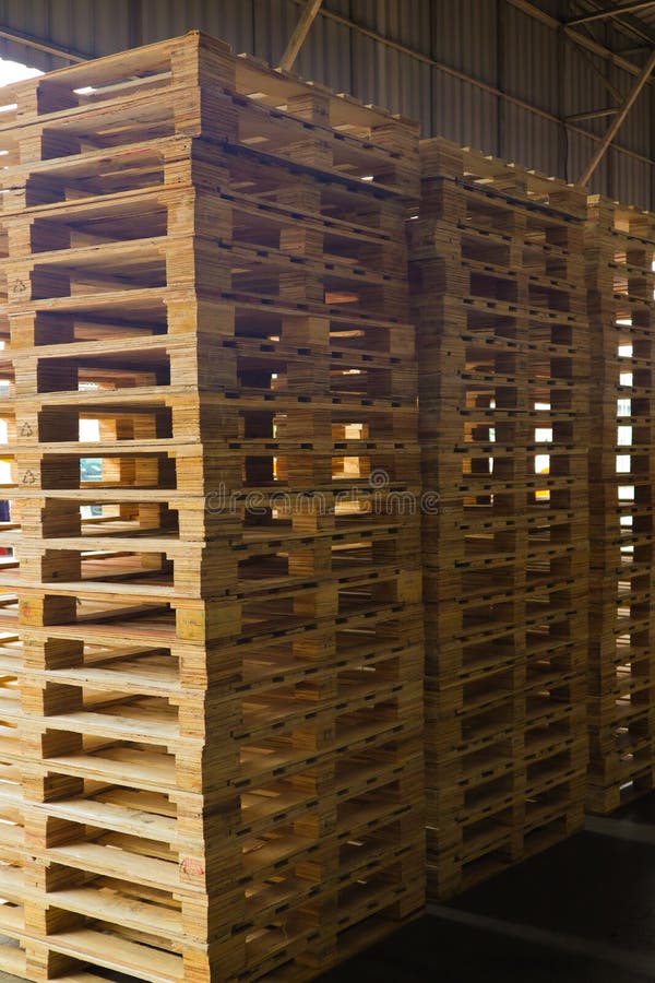 Wooden Pallets Stack at the Freight Cargo Warehouse for Transportation ...