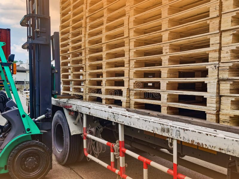 Wooden Pallets Stack at the Freight Cargo Warehouse for Transportation ...