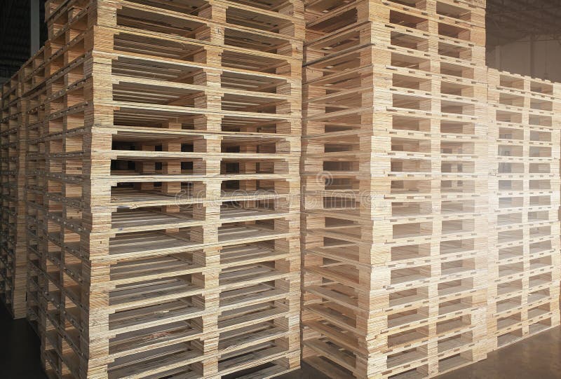 Wooden Pallets Stacked in Storage Warehouse Stock Image - Image of ...
