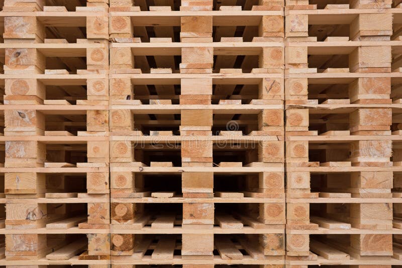 Wooden pallets in stock stock photo. Image of merchandise - 68247568