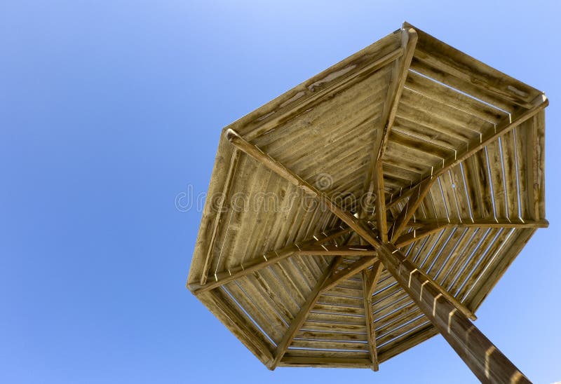 Wooden Parasol with Blue Sky on the Beach Stock Photo - Image of ...