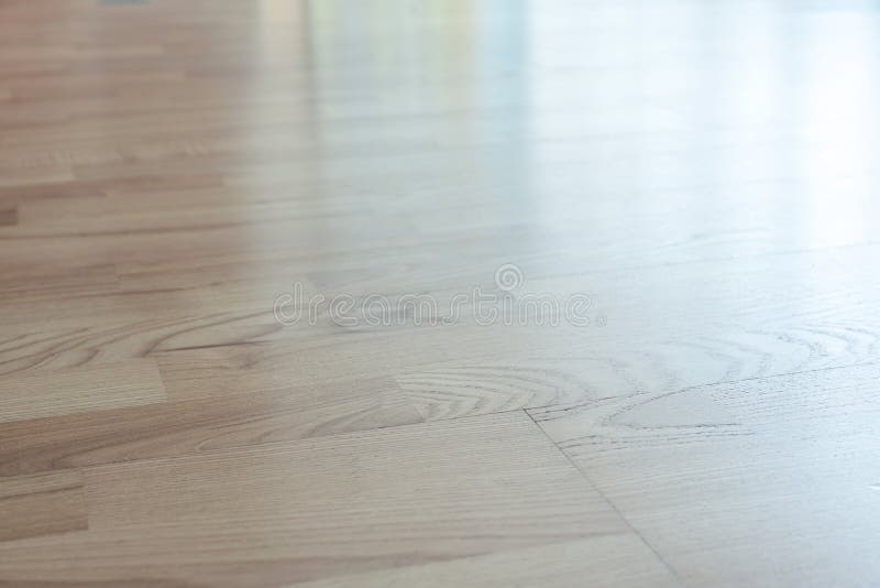 Wooden Parquet or Laminate Floor Surface with Light Reflection on ...