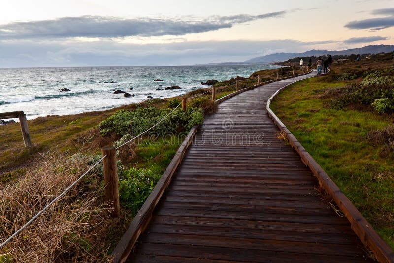 Wooden Path Along Side the Sea at Sunset Stock Image - Image of sunset ...