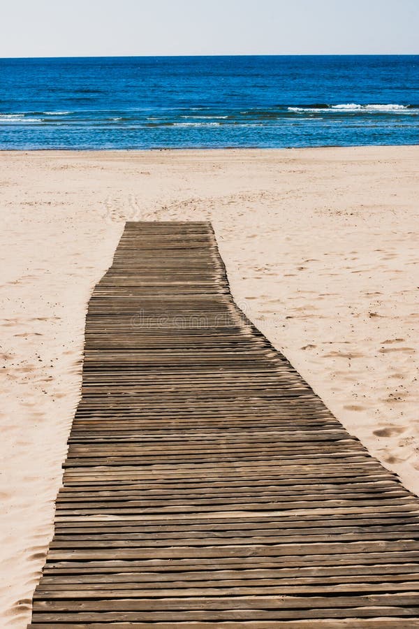 Wooden path on the beach stock image. Image of summer - 50168579