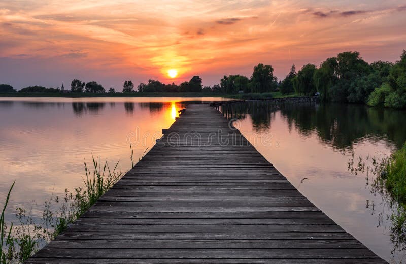Wooden Path Over the Lake at Sunset Stock Image - Image of park, scenic ...