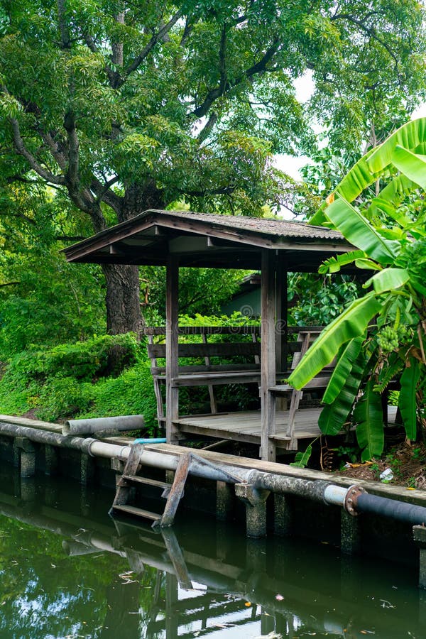 Wooden Pavilion by the Canal Stock Image - Image of reflection, rafting ...