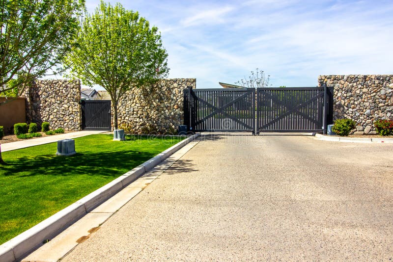Pedestrian and Auto Exit Gates on Housing Project Stock Image - Image ...