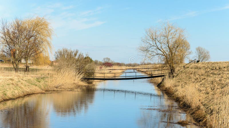 Wooden Pedestrian Bridge Over the Channel on the Sunny Spring Day Stock ...