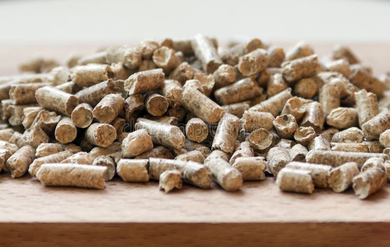 Wooden Pellets on Wooden Board Stock Image - Image of alternative ...