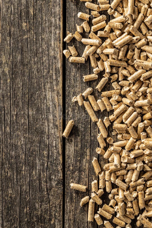 Wooden Pellets on Old Wooden Table. Ecological Heating Stock Image ...