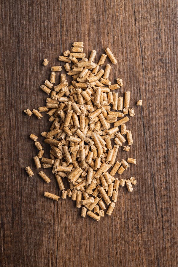 Wooden Pellets on Wooden Table. Top View Stock Photo - Image of biomass ...