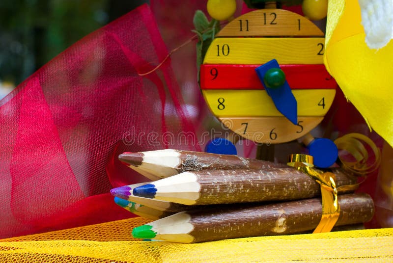 Wooden pencils and clock stock photo. Image of education - 11139204