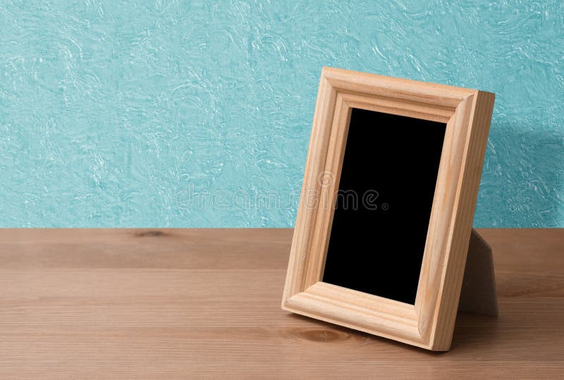 Wooden frame on table stock photo. Image of antique - 213529636