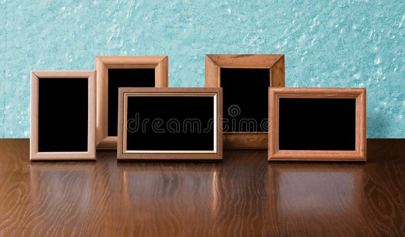 Photo frames on table stock image. Image of brown, deco - 213529281
