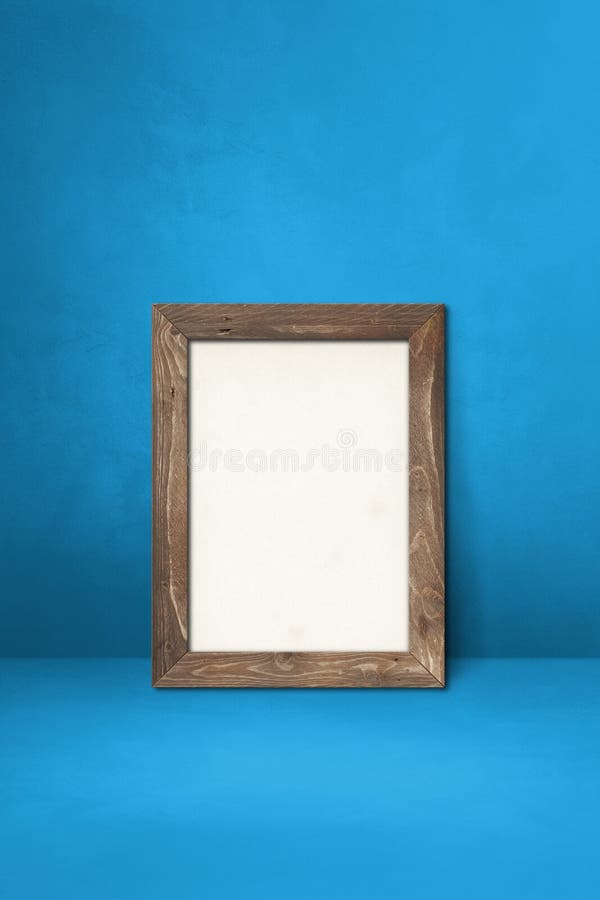 Wooden Picture Frame Leaning on a Blue Wall Stock Illustration ...