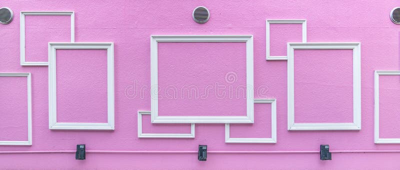 Wooden Picture Frames Decorated on Pink Wall Stock Photo - Image of ...