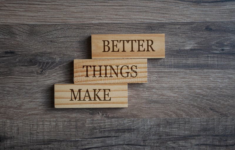 Wooden Pieceswith Message Make Things Better on Wooden Background Stock ...