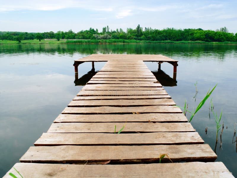 Wooden pier stock photo. Image of reflection, lonely - 16051788